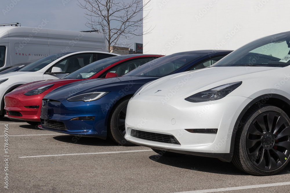Tesla EV electric vehicles on display. Tesla products include electric ...