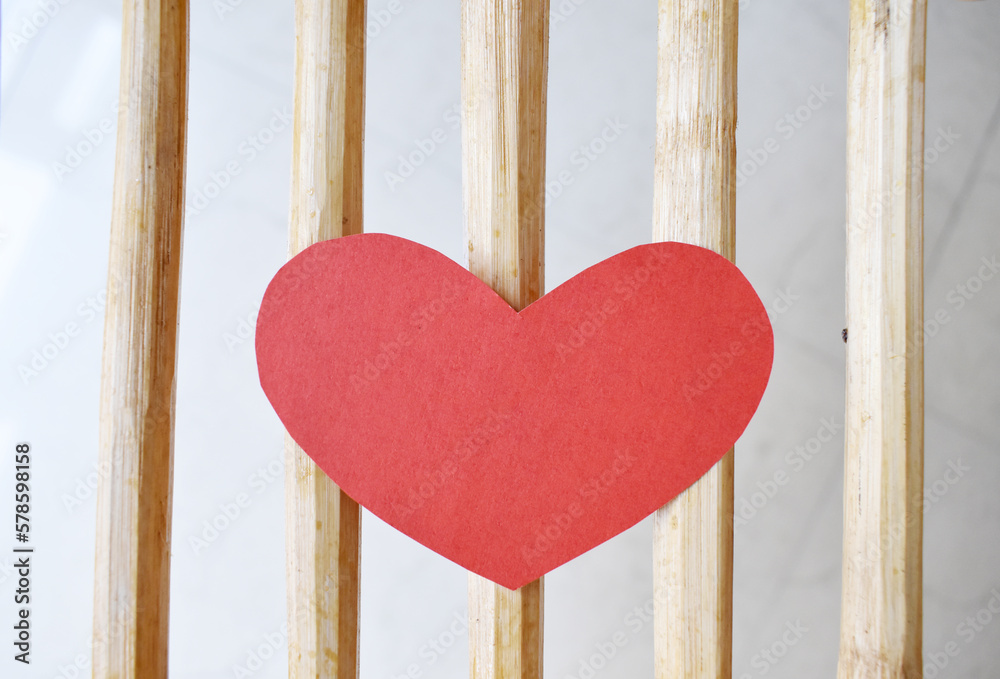 Paper cut red heart shapes on off wooden strips background in Pune ...