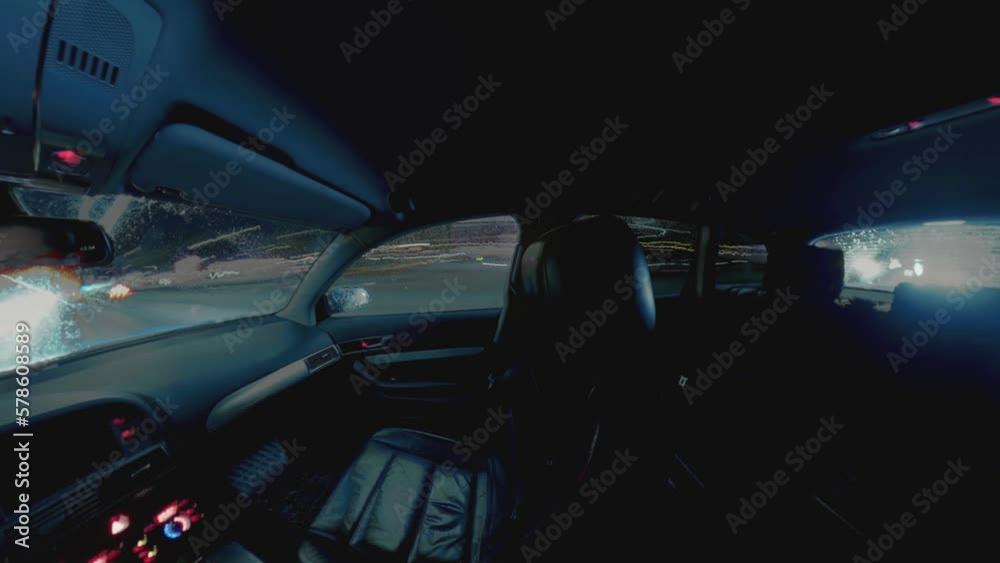 Time-Lapse Footage of Light Trails Behind the Window of a Driving Car ...