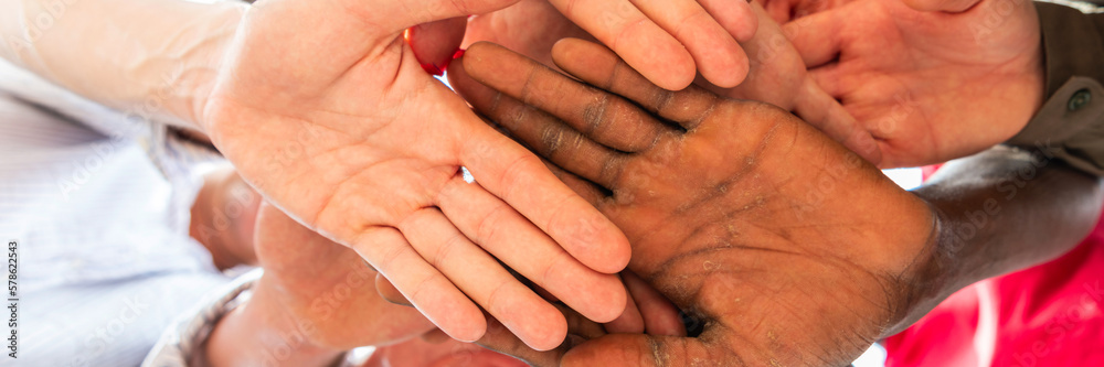 Hands in stack of multiracial young people – multicultural friends with ...