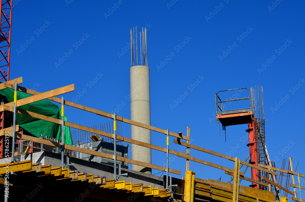 pouring concrete into the form. formwork in the form of a cylinder from ...