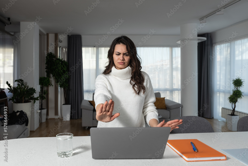 Young shocked businesswoman annoyed unpleasant spam message pop-up ad ...