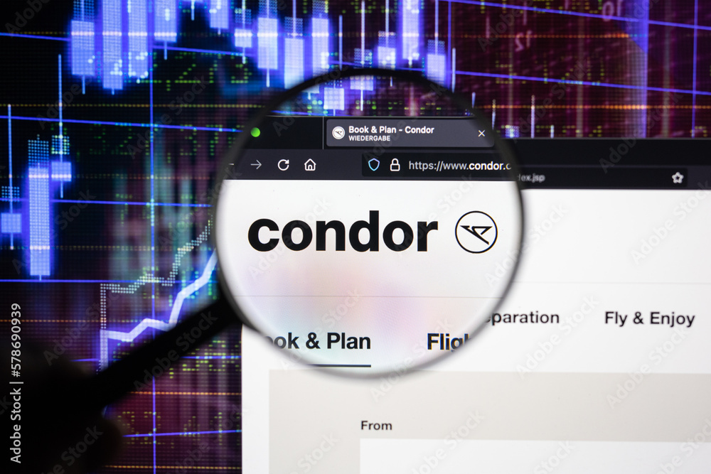 Condor airline company logo on a website with blurry stock market ...