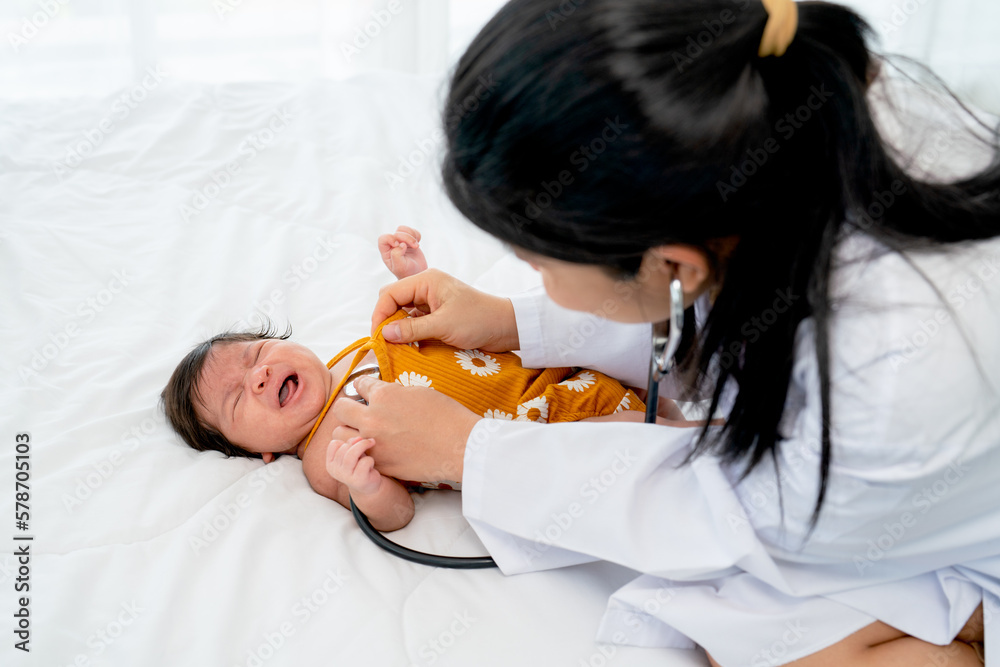 The doctor use stethoscope to check the symptom of newborn baby cry and ...