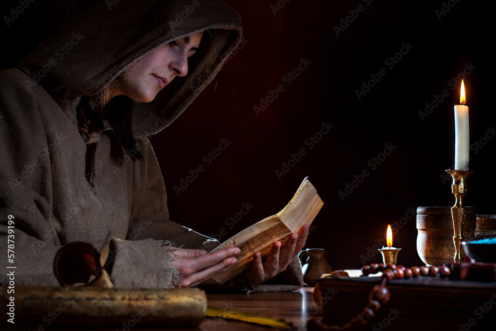 Poster Medieval poor woman reads letter by candlelight – Wall Art ...