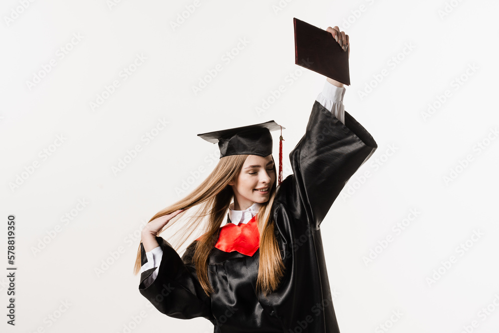 Graduate girl is graduating college and celebrating academic ...