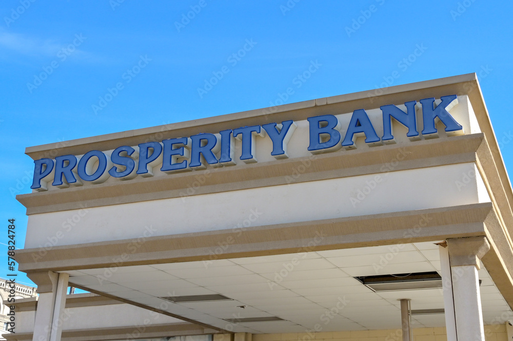 Galveston, Texas - February 2023: Sign on the canopy of a drive thru ...