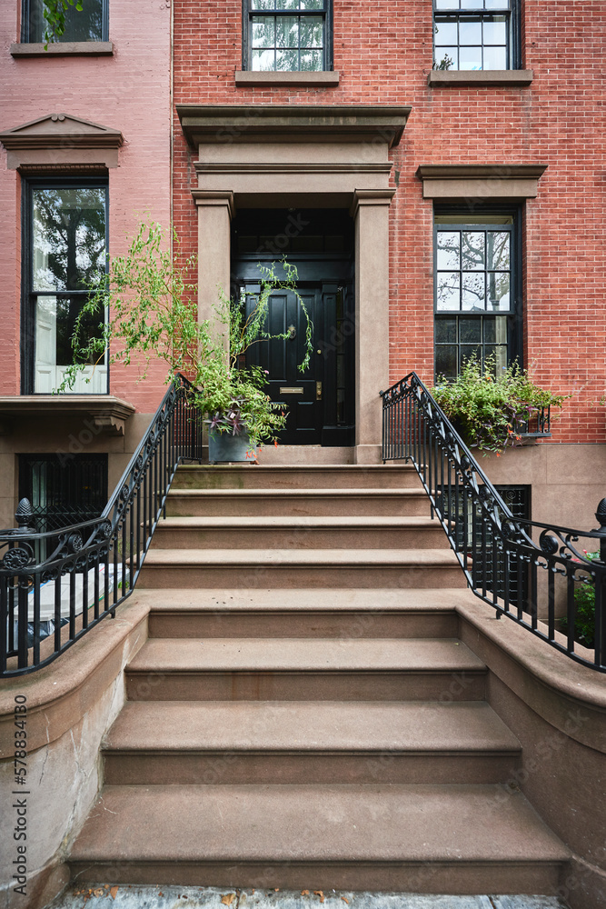 Poster a classic brownstone building on an iconic street in Manhattan ...