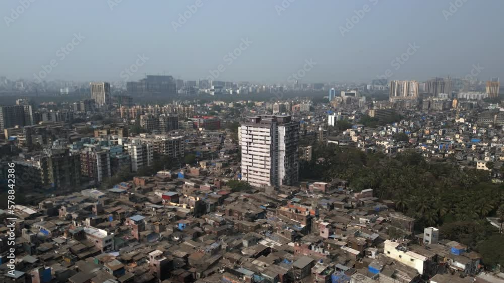 Aerial view of Dharavi slums and Mumbai cityscape in Mumbai, Maharashtra, India. Dharavi is ...