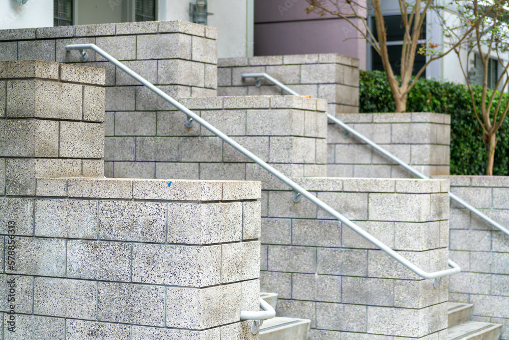Brick brutalist style front porch or stoop with stacked blkocks and ...