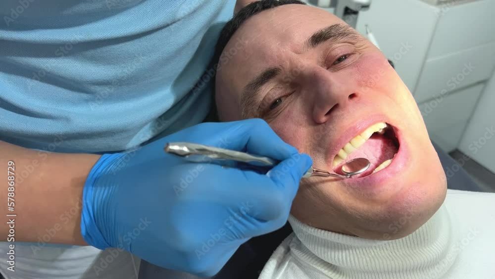 Close up cropped photo of curing healing operating teeth tooth, filling mouth cavity against ...
