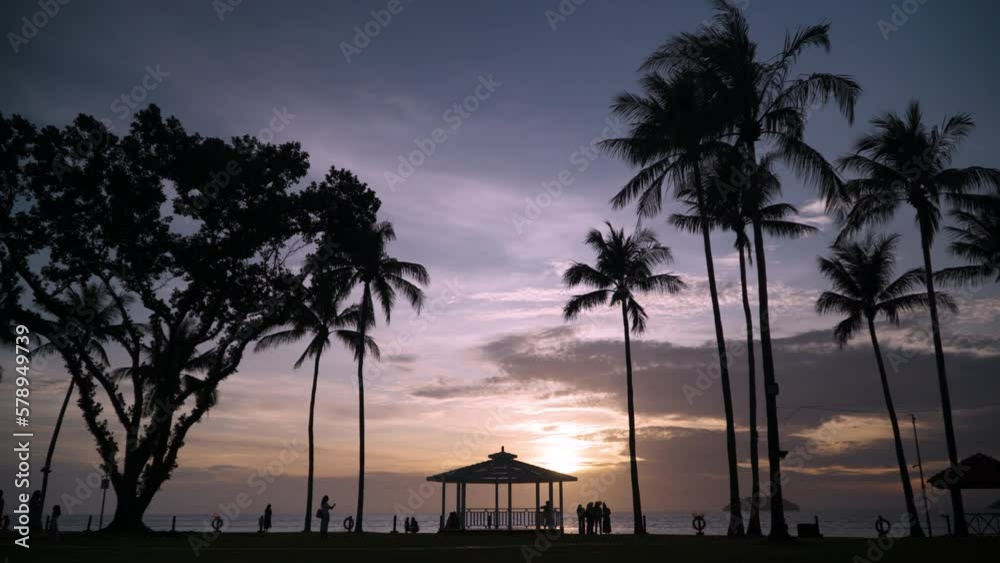 Tanjung Aru Beach - Silhouetted Tropical Palms and People Tourists ...