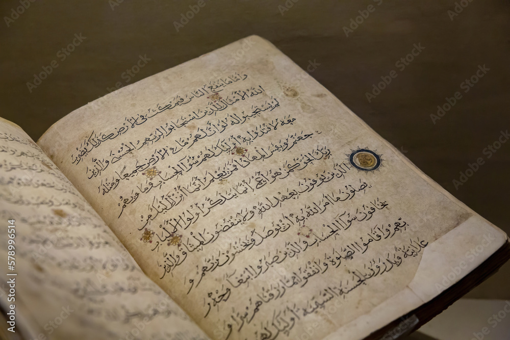 Ancient open book manuscript (verses of Koran Book, Holy Islamic Text ...