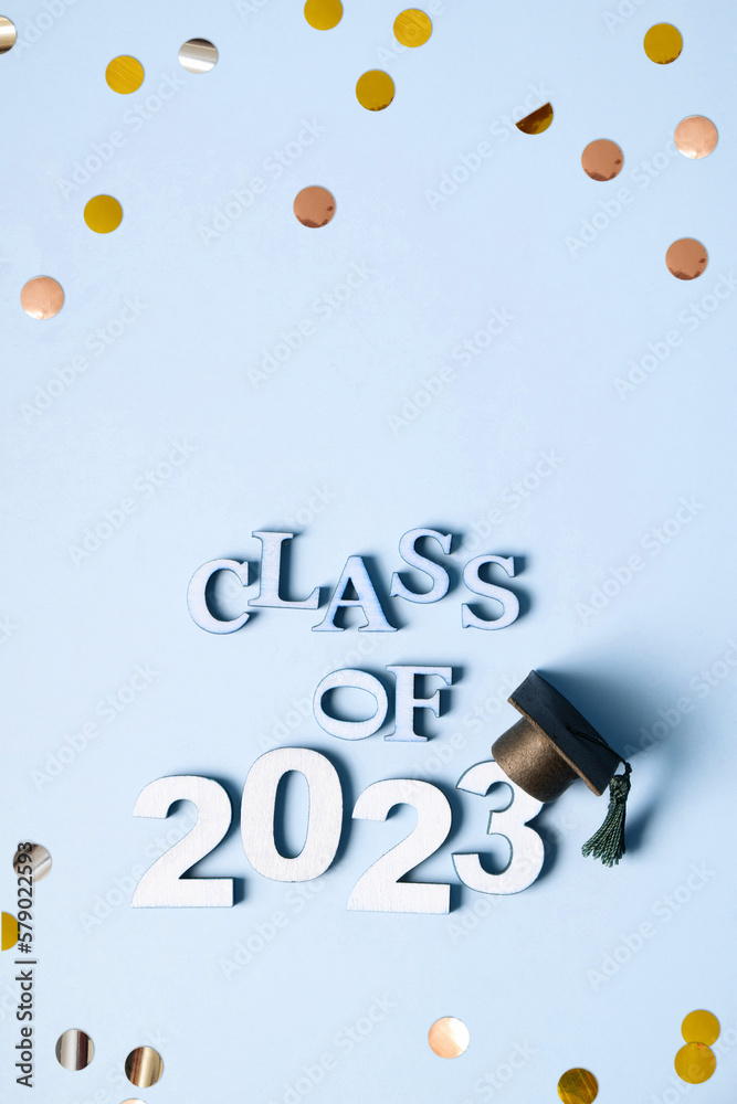 Class of 2023 concept. Wooden number 2023 with graduated cap on blue ...