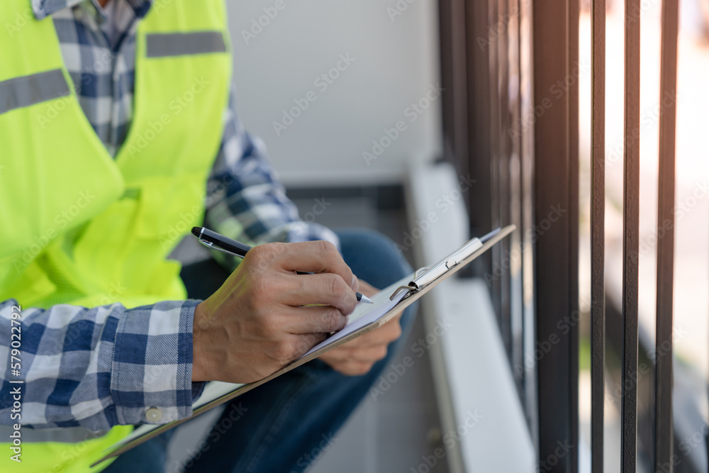 inspector or engineer is inspecting construction and quality assurance ...