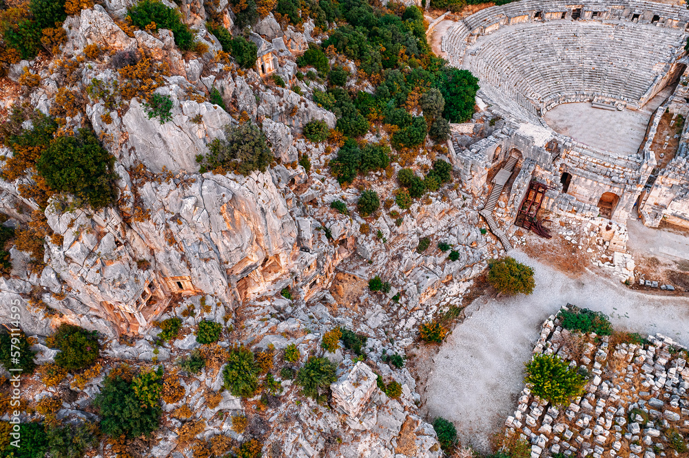Aerial Top view Ancient lycian rock tomb ruins Myra in Demre Antalya, Turkey. Old tombs and ...