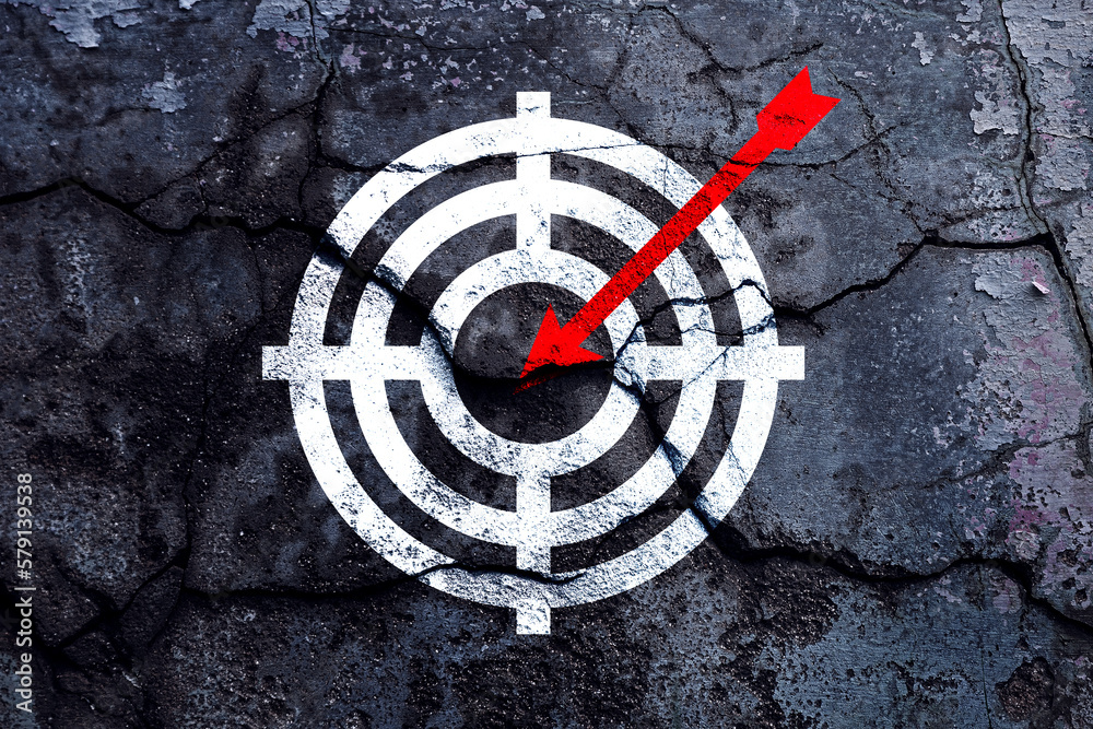 Target figure on broken wall, concept of achieving goal quality, Aim ...