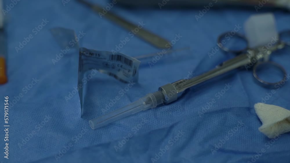 Surgical dental instruments on the table during an operation to remove ...