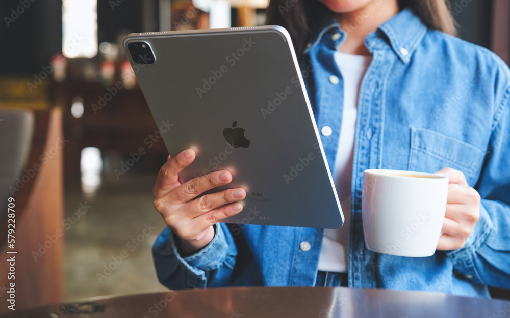 Mar 2nd 2023 : A woman holding and using Apple New Ipad Pro 2020 ...