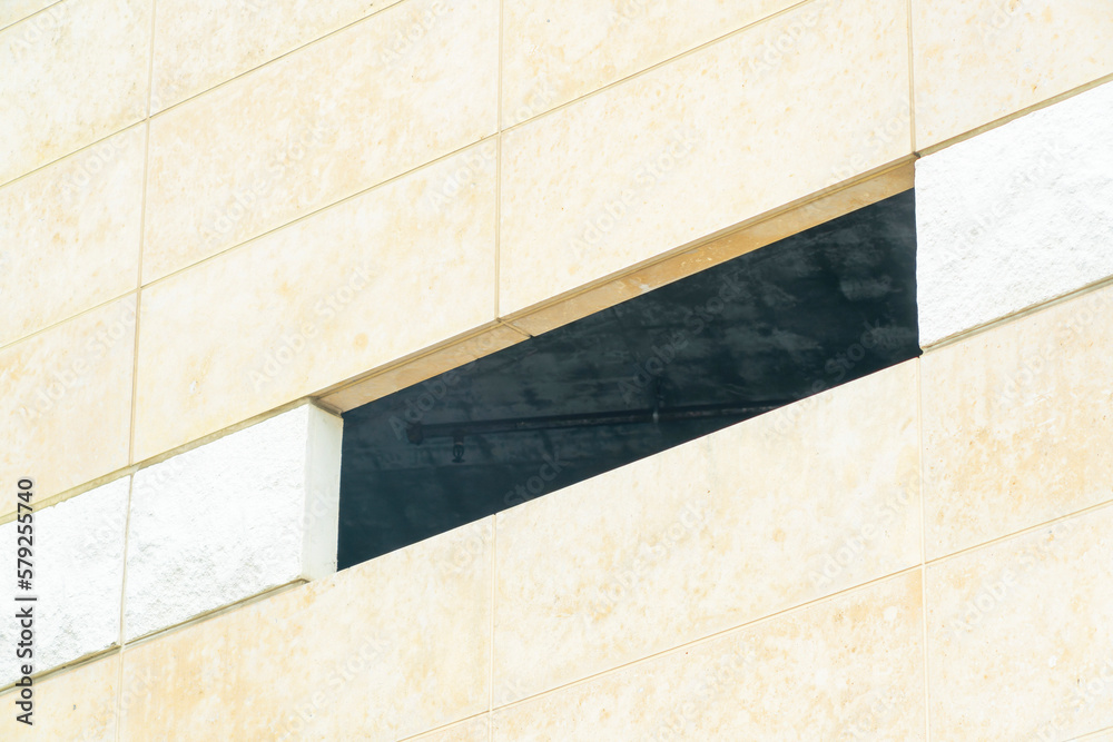 Building texture facade with cream off white color and egg shell accent ...