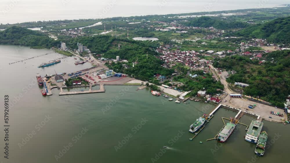 Cargo container transport ship and ferries parked at the port of ...