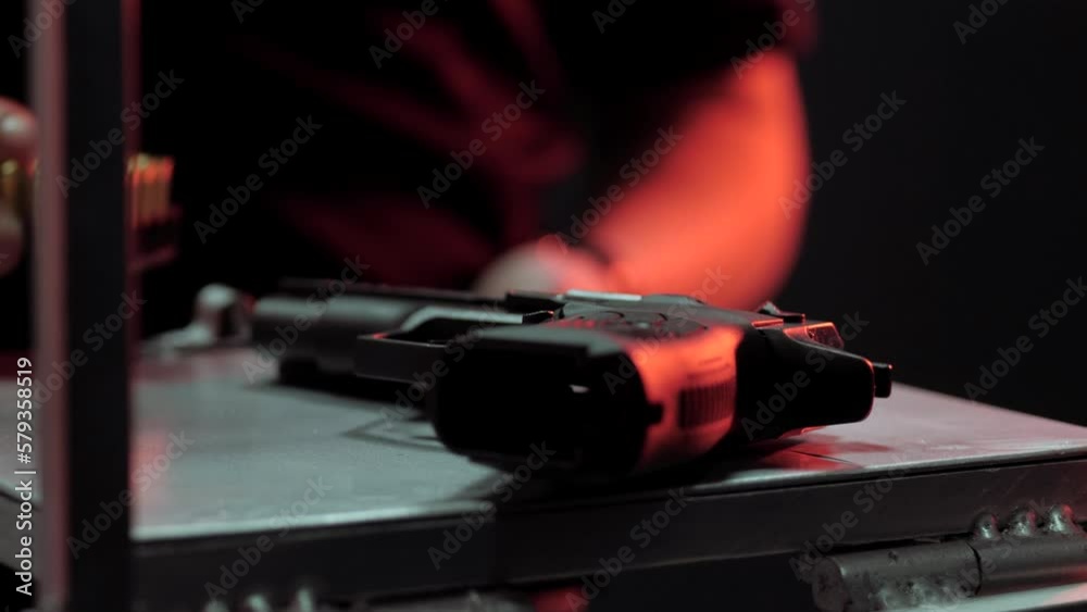 Firearm. Gun safe, gun box. Modern black pistol gun Investigator ...