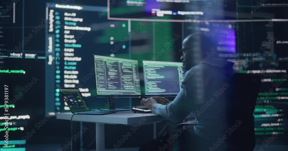 Portrait of a Black Man Working on Computer, Typing Lines of Code that ...