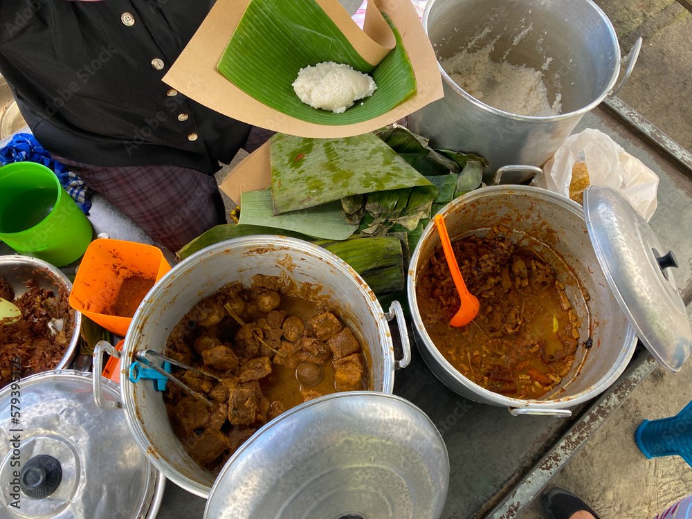 Gudeg seller on the roadside. Gudeg is one of the typical Indonesian ...