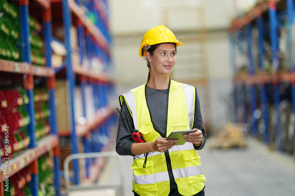 Foto de Warehouse workers checking the inventory. Products on inventory ...