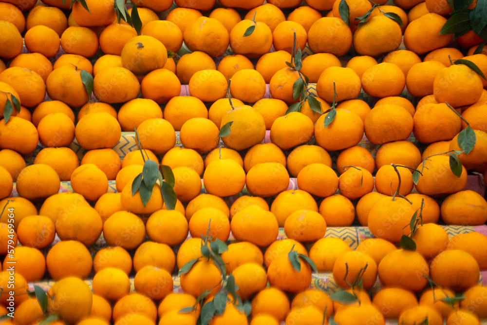 oranges kinnu citrus fruit piled up at a roadside stall showing how ...