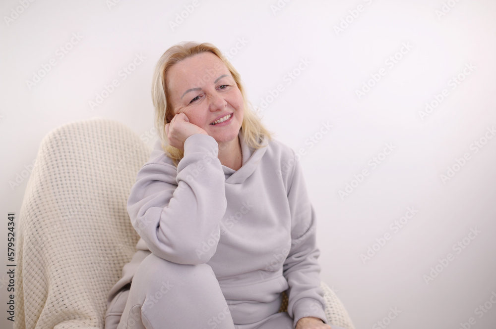 Foto de Smiling cheerful fun elderly gray-haired blonde woman lady 40s ...