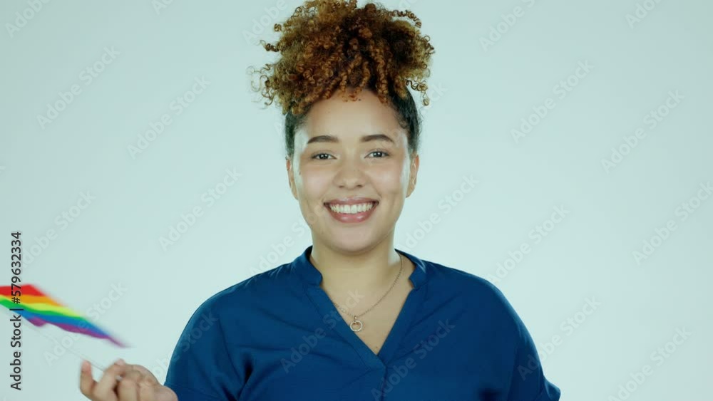 Face, woman and rainbow flag in studio for pride support, lgbtq choice ...
