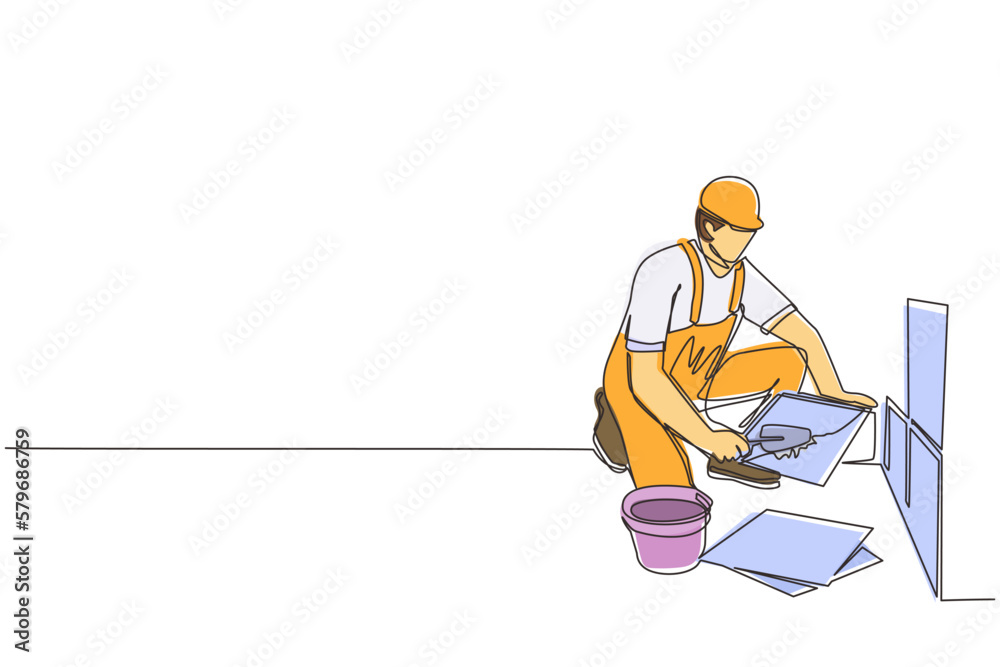 Single one line drawing repair worker laying ceramic wall tile ...