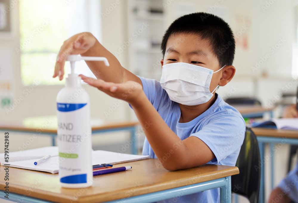 Covid, hand sanitizer and school student with mask cleaning, protecting ...