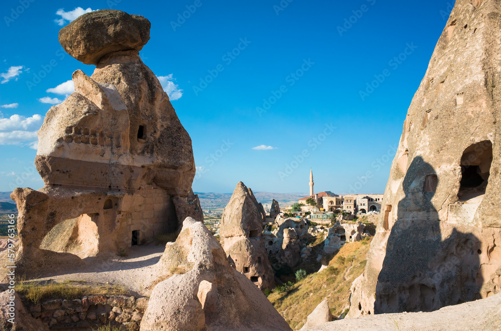 Cappadocia cave town, Ancient ruins of cave houses cut in cone shaped ...