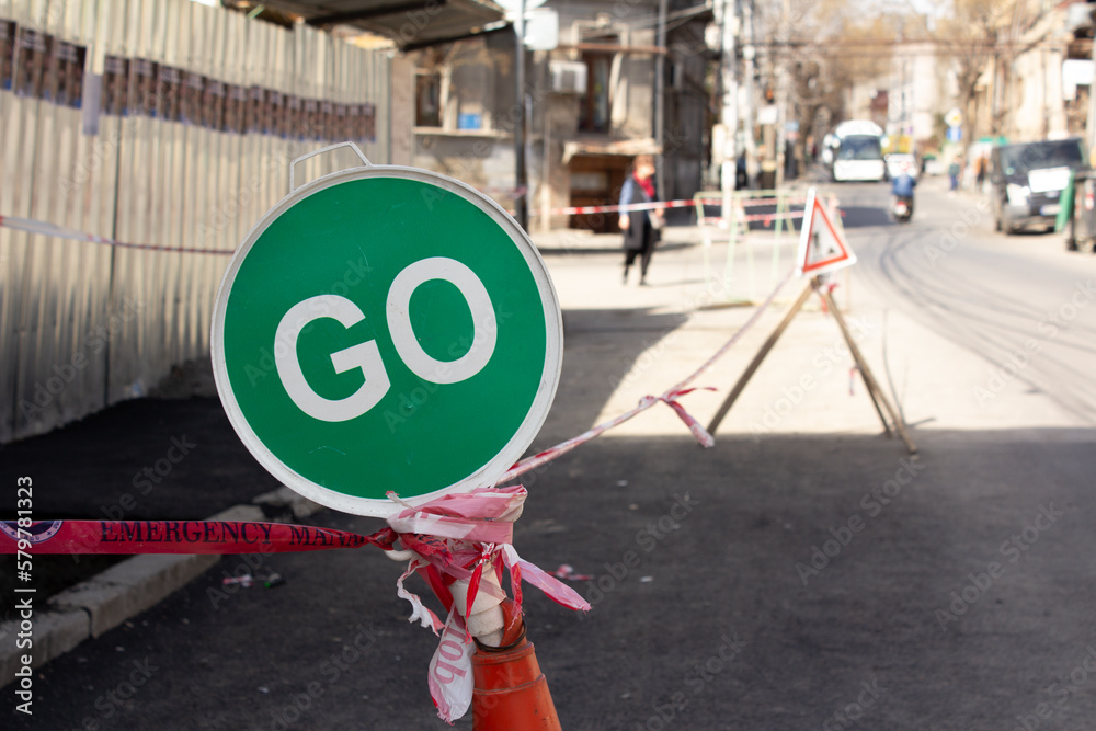 Street photography. Permissive road sign. Green circle with white ...
