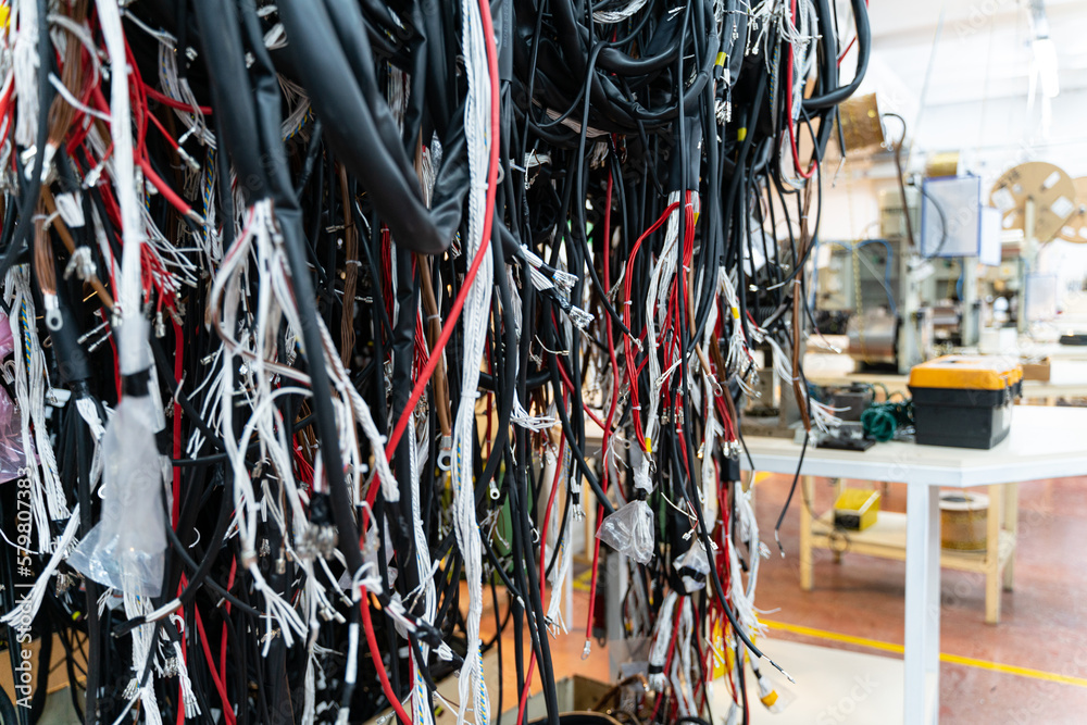 shelf with wires and connectors in a wire harness factory Stock Photo ...