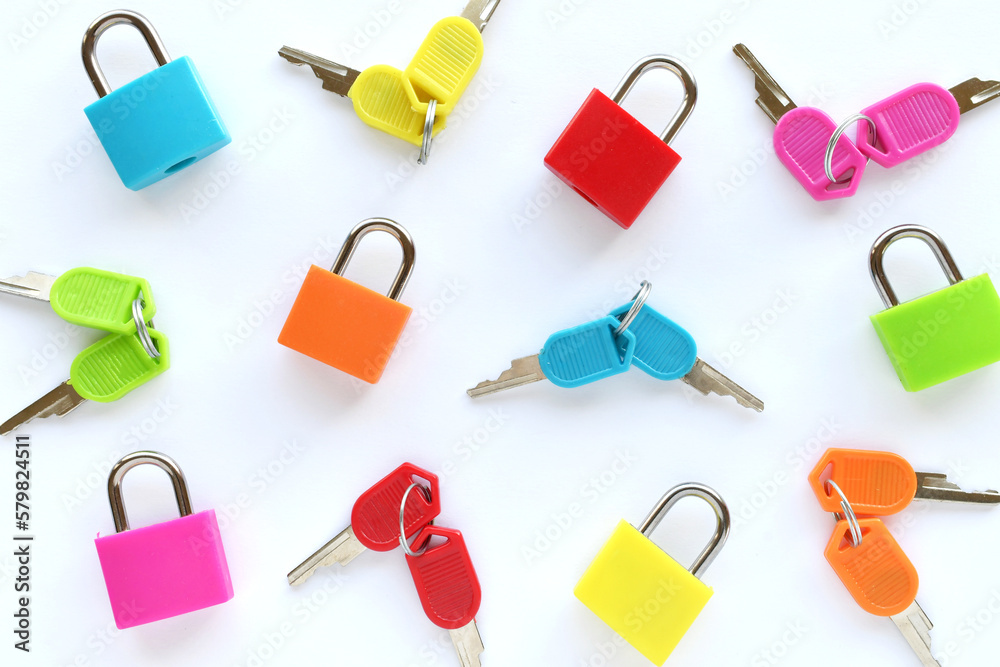 Colorful padlock locks keys on white background. Concept for safety for ...