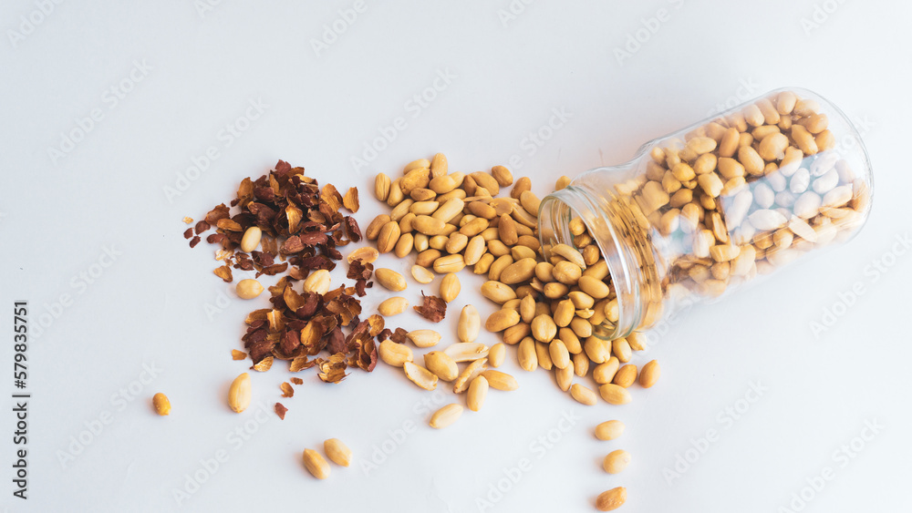 Roasted peanuts isolated on white background. Groundnut seeds shells ...