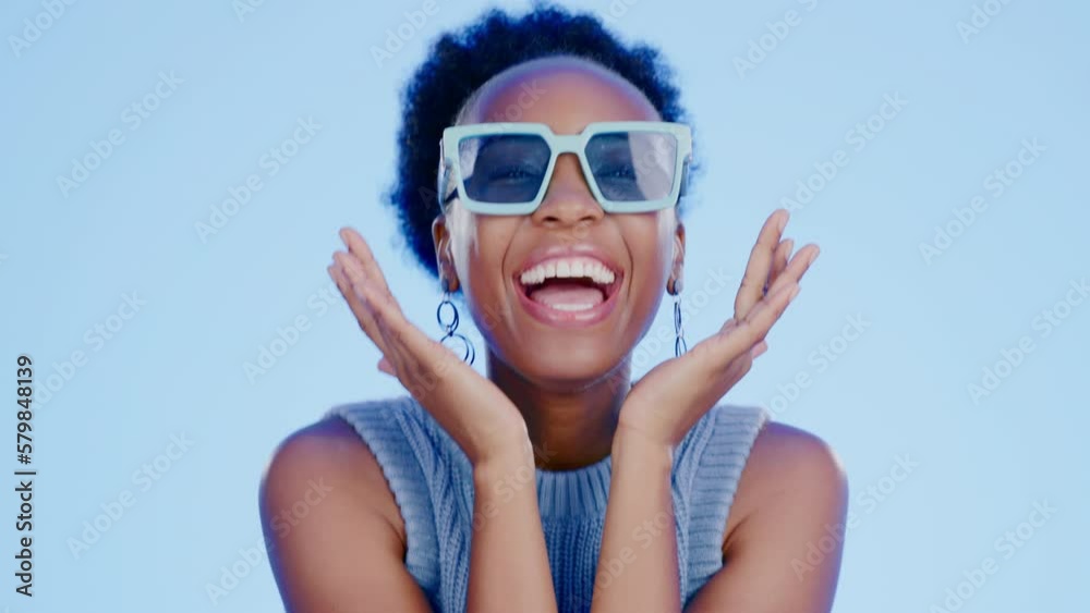 Black woman, sunglasses and face in studio with happy, excited and ...