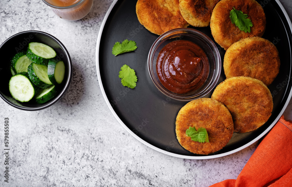 Potato spice patties, Aloo Tikki. Indian street food Stock Photo ...