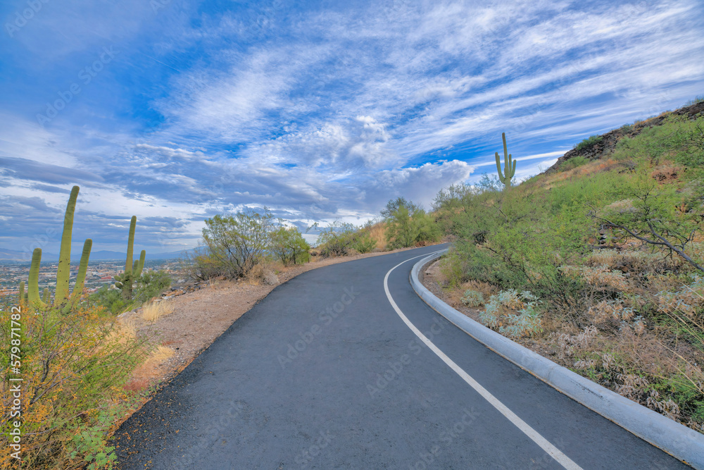 Uphill bicycle and walkway pathway on a slope at Tucson, Arizona ...