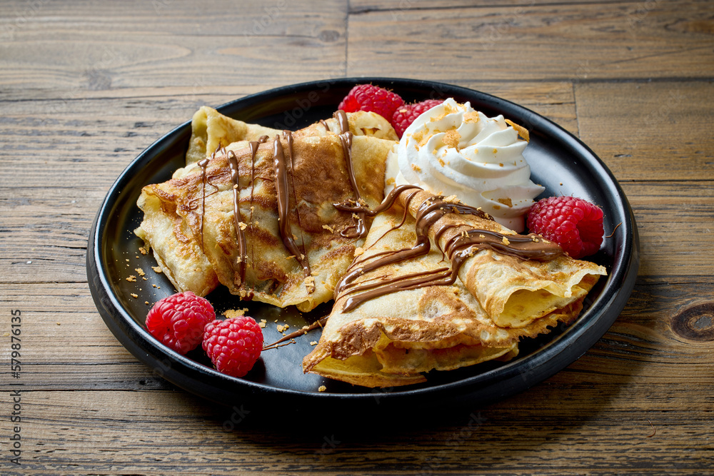 freshly baked crepes Stock Photo | Adobe Stock