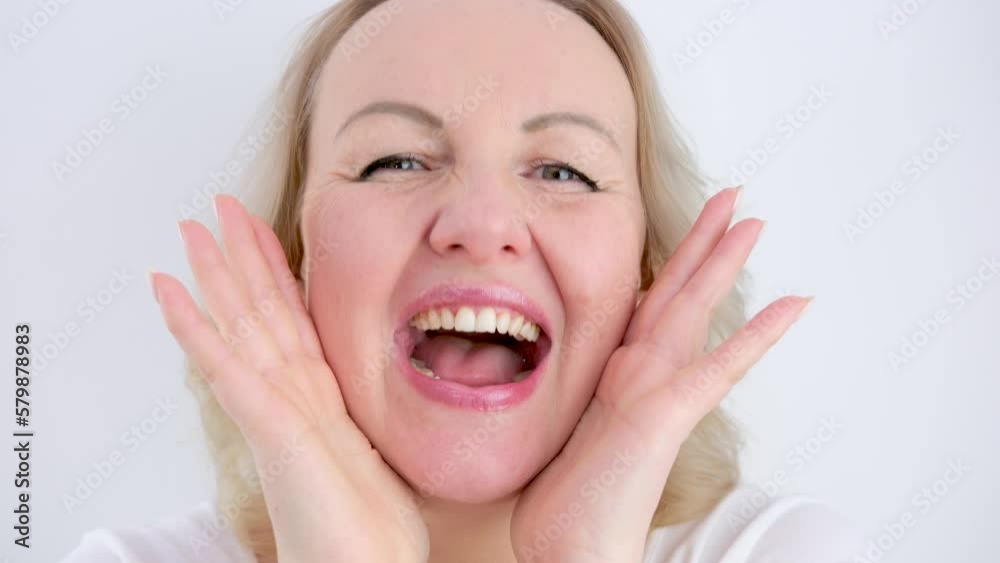 Wideo Stock: different cheerful positive emotions of a girl woman put 2 ...