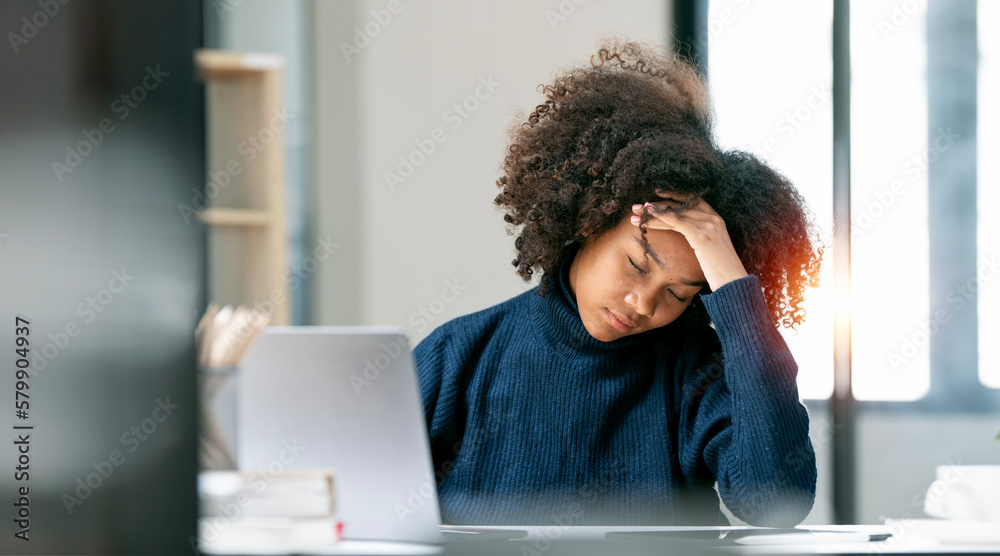 Stressed overwhelmed african businesswoman feels tired at work ...