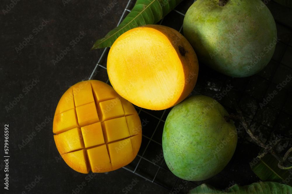 High angle view of mangoes with cooling rack on table Stock Photo ...