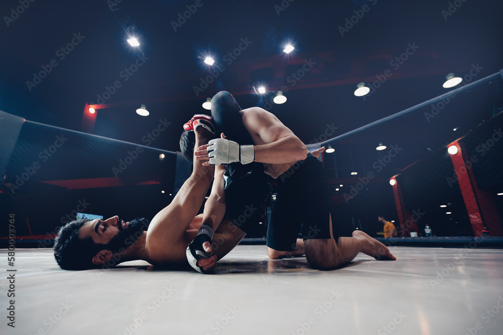 Boxers fighter Pain suffocation in MMA ring cargo octagon, dark ...
