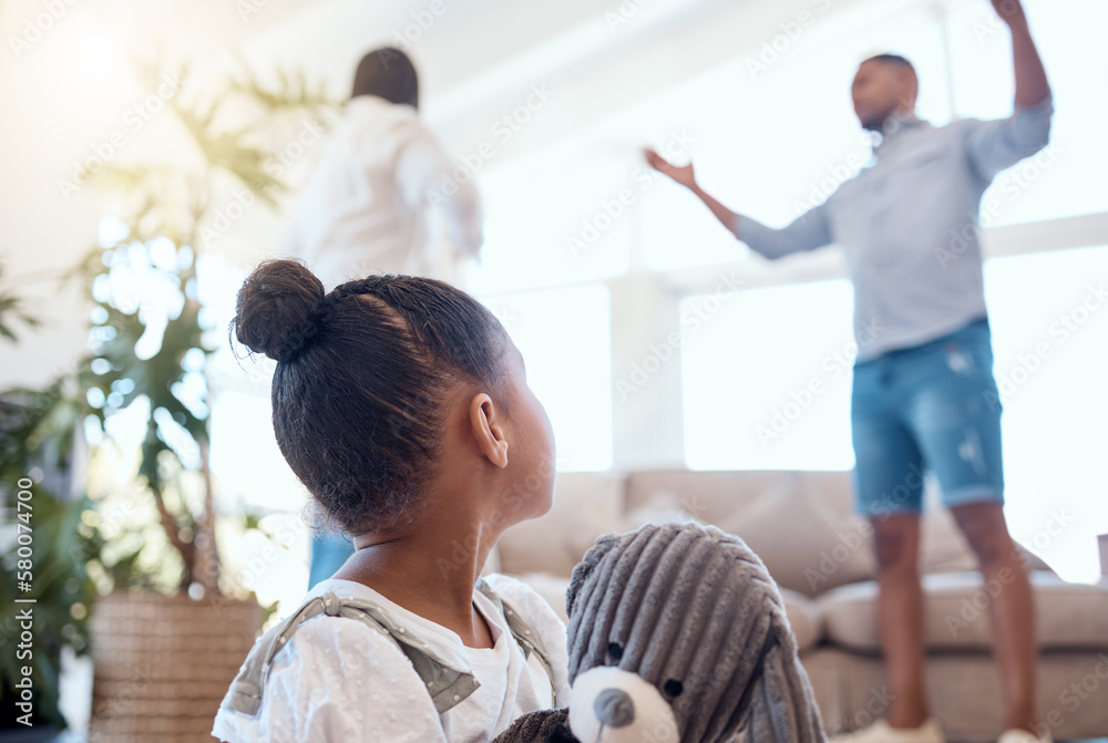 Argument, divorce and scared child in the living room with a teddy bear ...