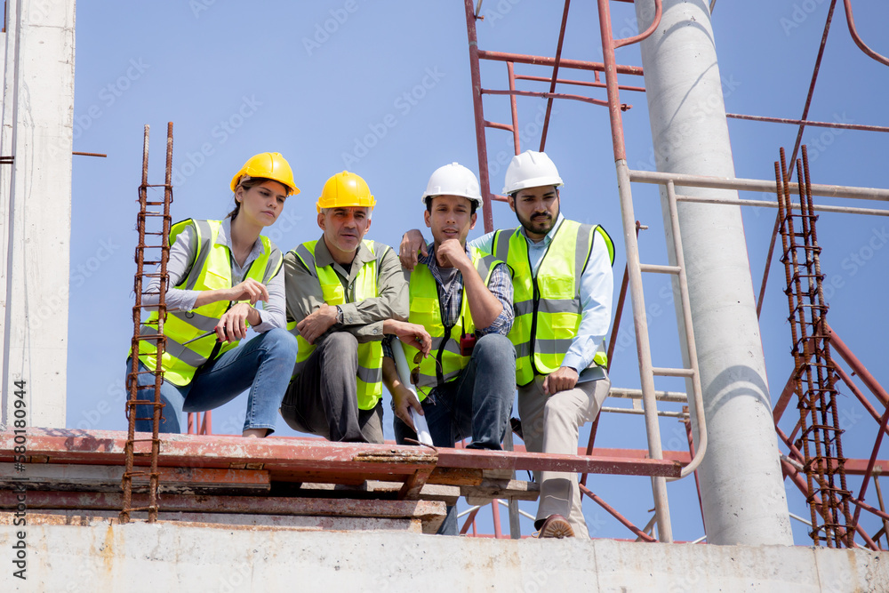 Team group of contractor and architect with foreman explaining about ...