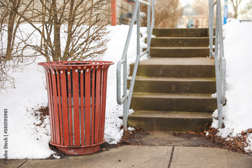Trashcan and garbage bin outdoor in the street symbolizing ...